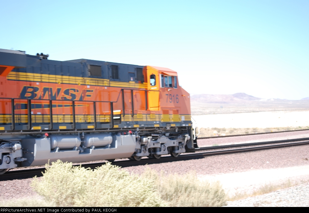 BNSF 7916 passes me by as she rolls into the BNSF Barstow yard for a crew change.